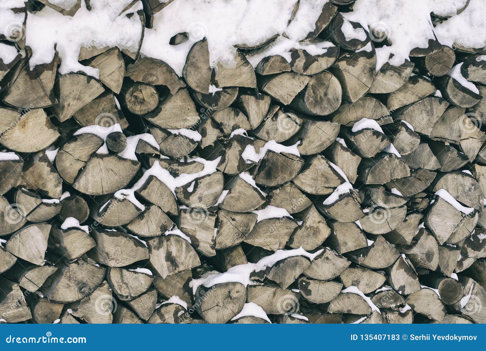 Chopped Firewood on a Stack in Snow. Front View Stock Image - Image of ...
