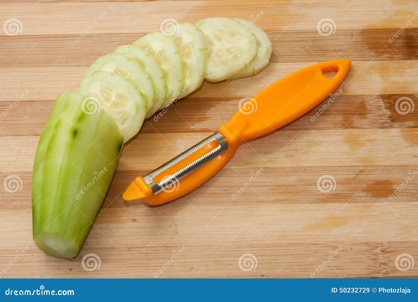Chopped Fresh Cucumber with a Tool for Peeling Stock Image - Image of ...