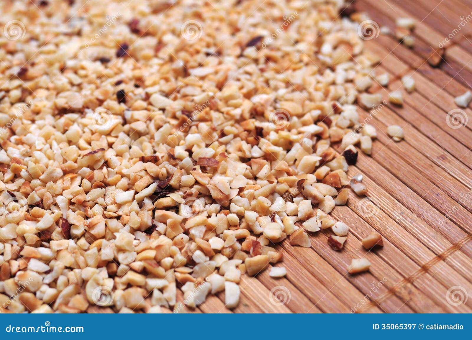 Chopped hazelnuts pieces stock image. Image of small - 35065397