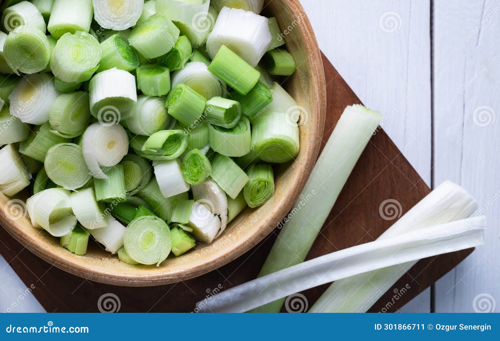 Chopped Leek in a Wooden Bowl on White Wooden Background Stock Image ...