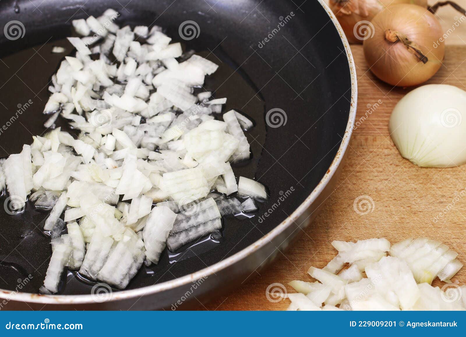 Chopped onion in a pan stock image. Image of ingredient - 229009201