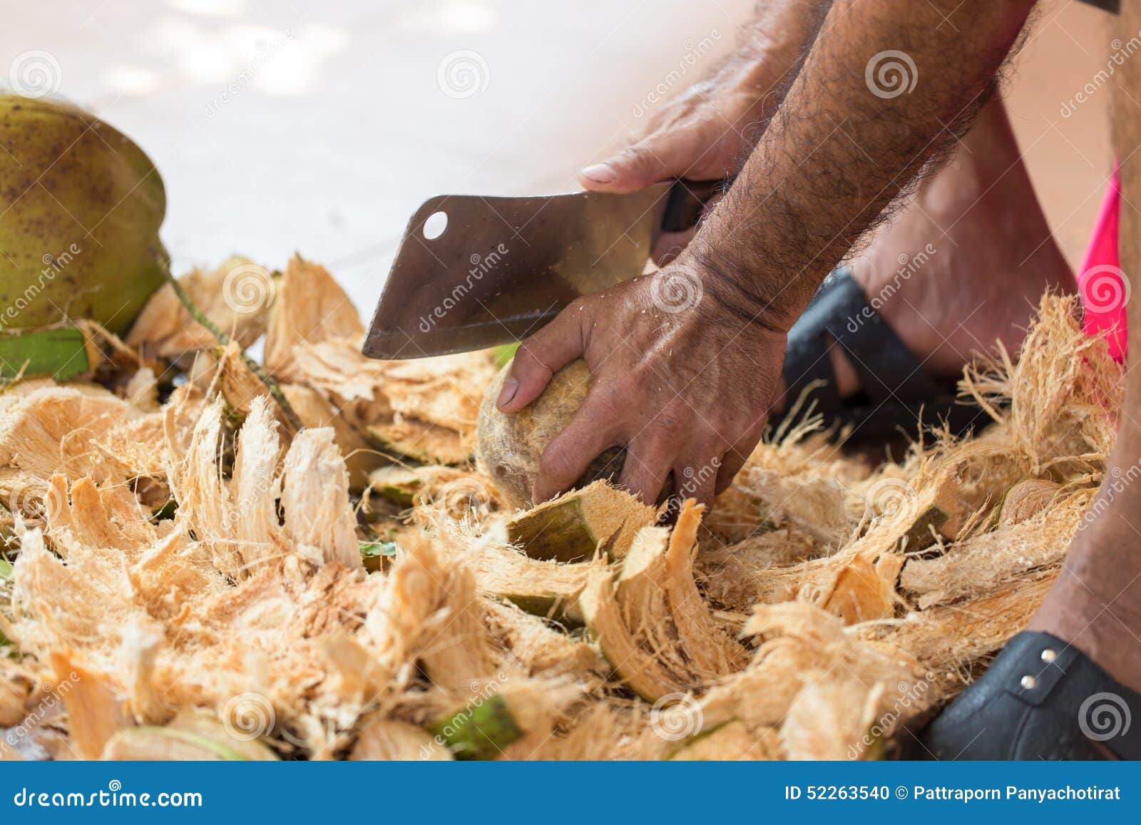 Chopping coconut by knife stock photo. Image of fresh - 52263540