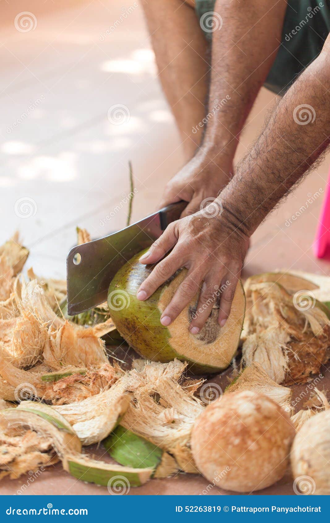 Chopping coconut by knife stock image. Image of cleaver - 52263819