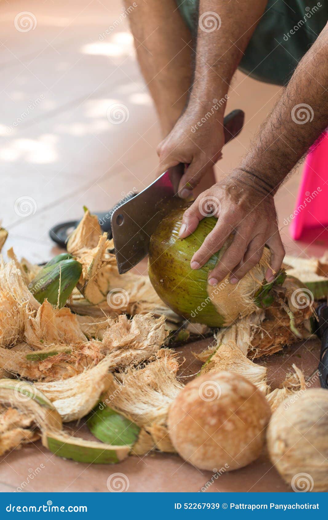 Chopping coconut by knife stock image. Image of refreshment - 52267939