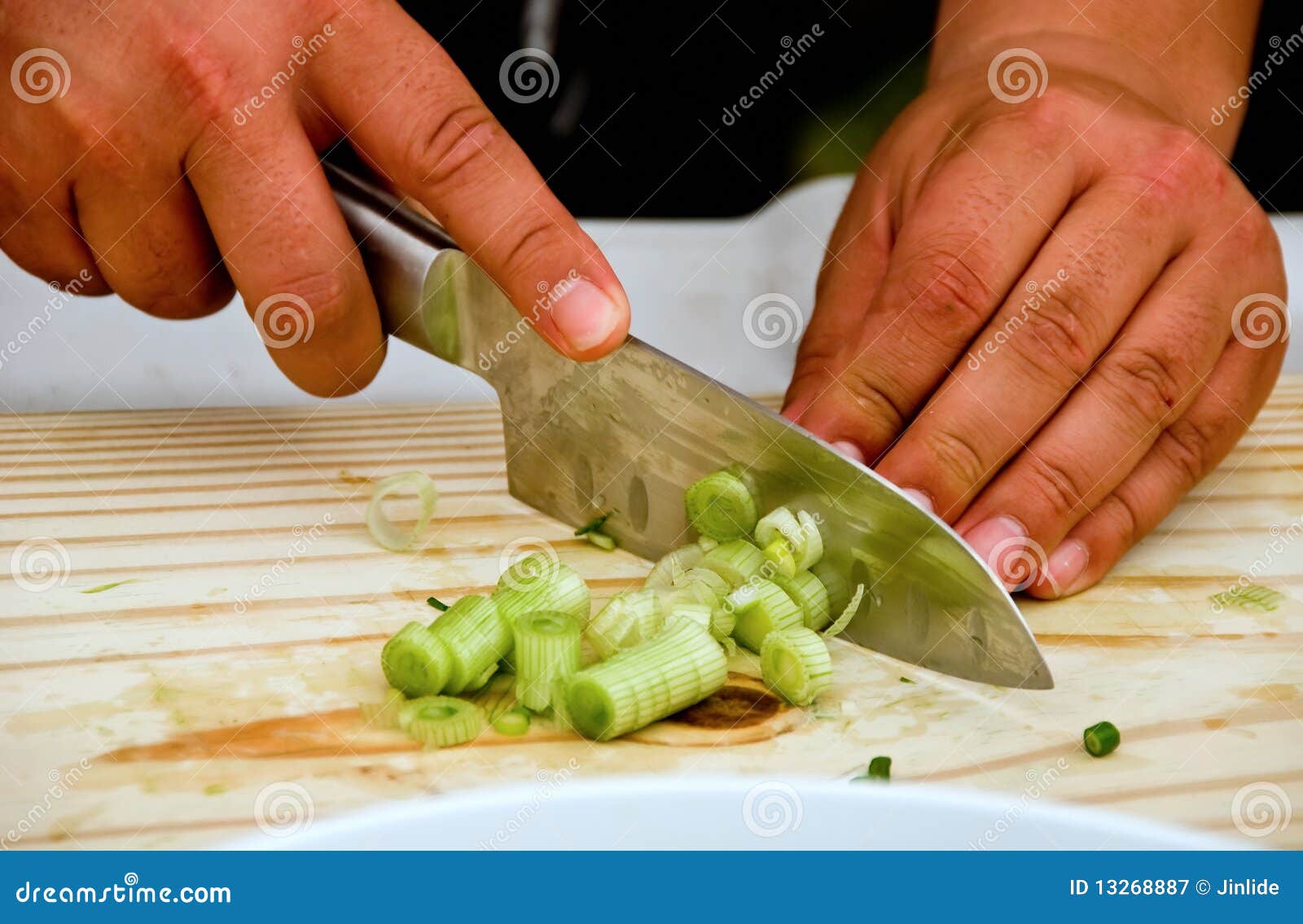 Chopping green onions stock image. Image of preparation - 13268887