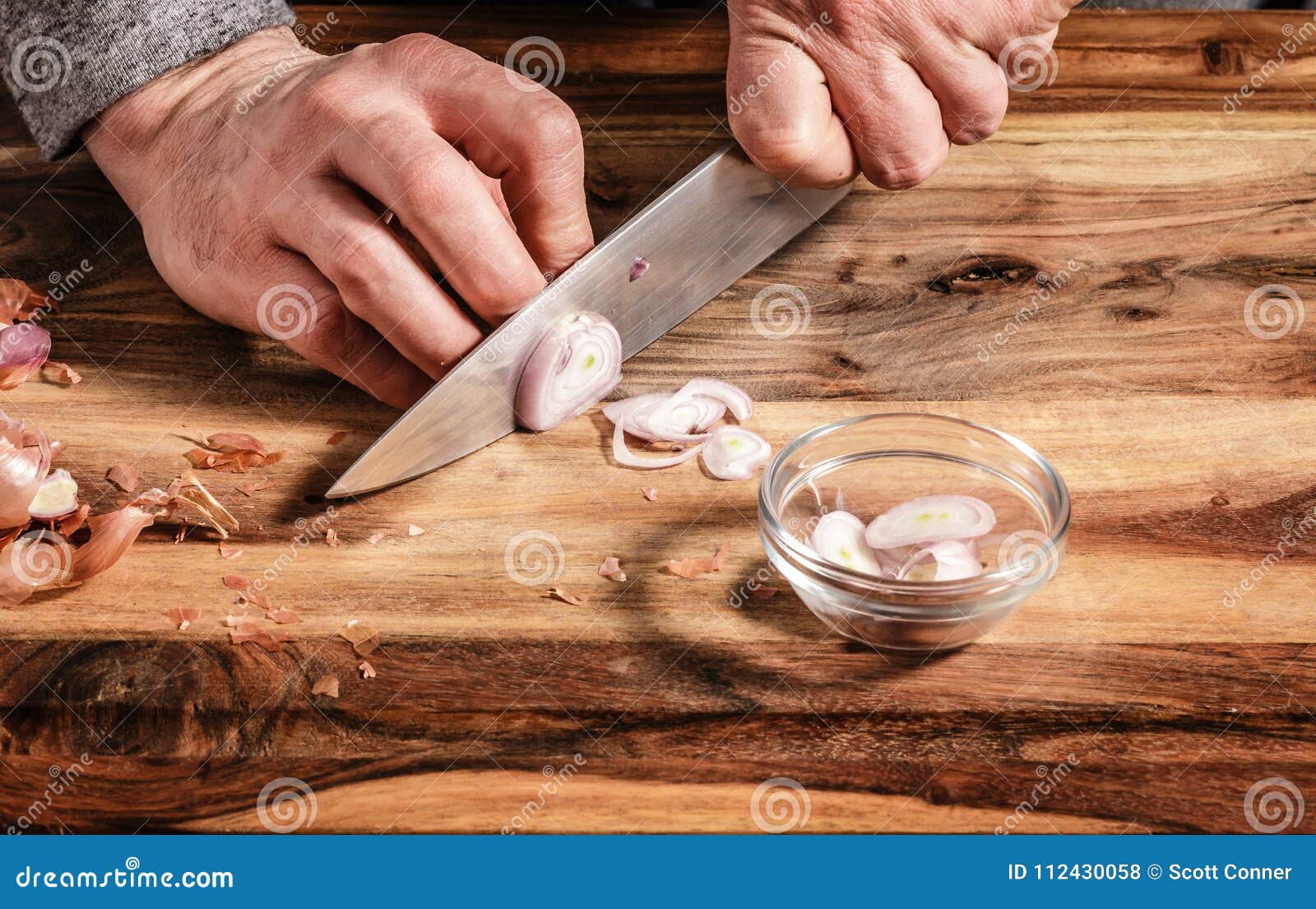 Chopping Shallots for Dinner Stock Photo - Image of hands, ingredient ...