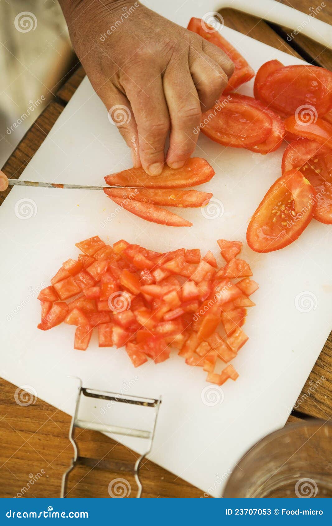 Chopping the tomatoes stock image. Image of step, people - 23707053