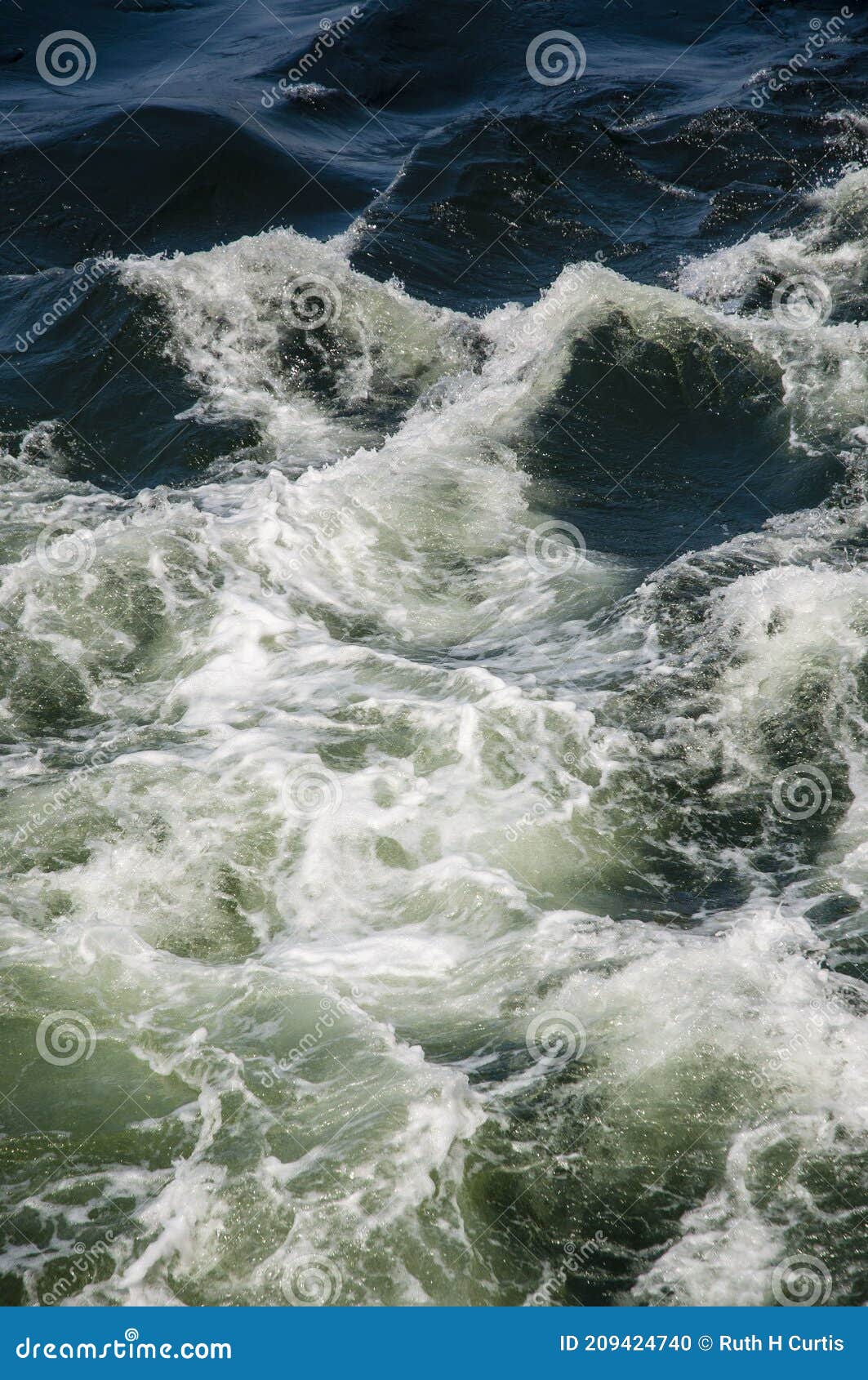 Choppy Waters Swirling Near the Coast Stock Photo - Image of entrance ...
