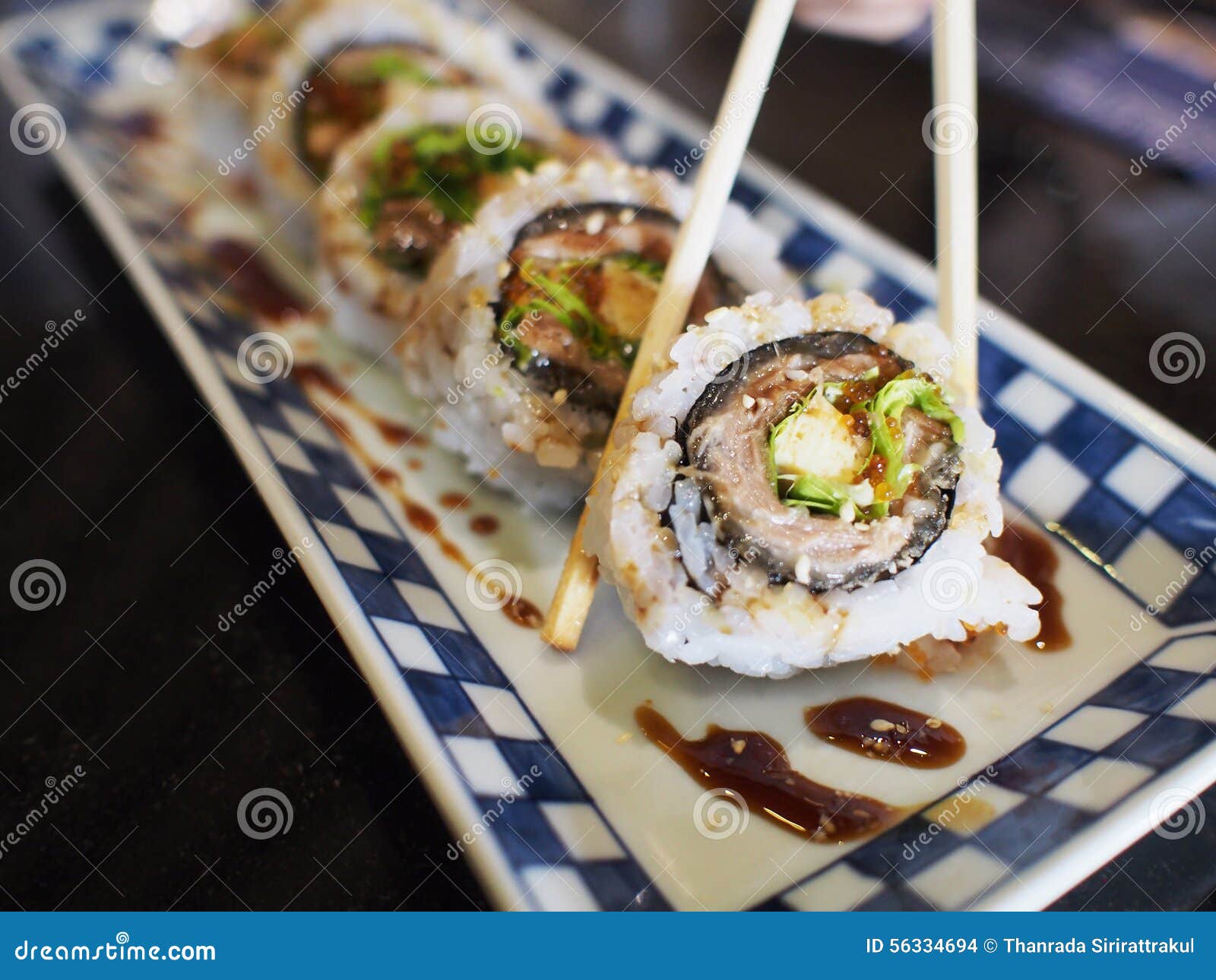 Chopstick on sushi stock photo. Image of chopstick, food - 56334694