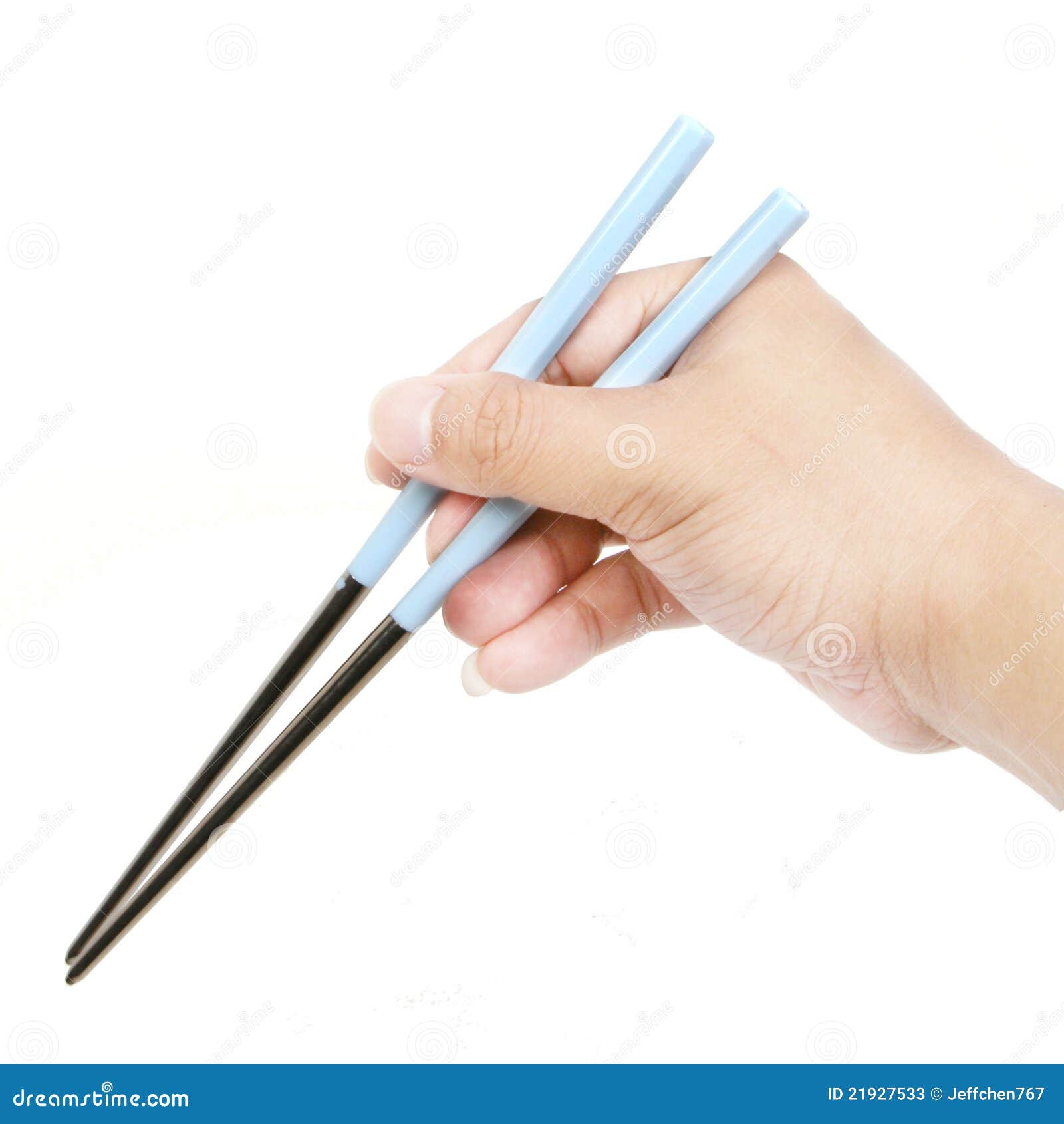The chopsticks in hand stock image. Image of cutlery - 21927533
