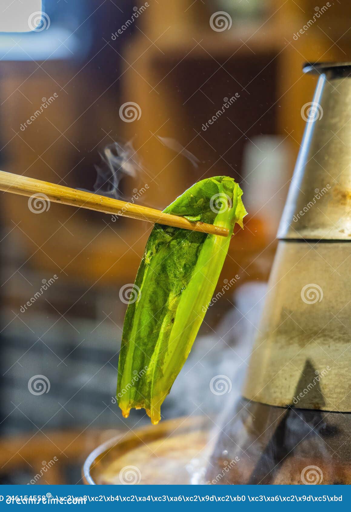 Chopsticks Pick Up Various Ingredients in the Hot Pot Stock Photo ...