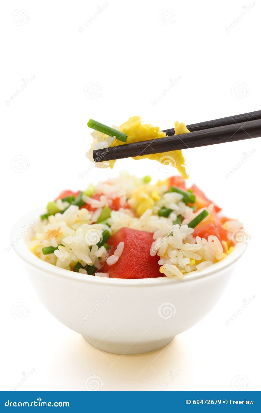 Chopsticks Picking Up Fried Rice and Egg on White with Clipping Path ...