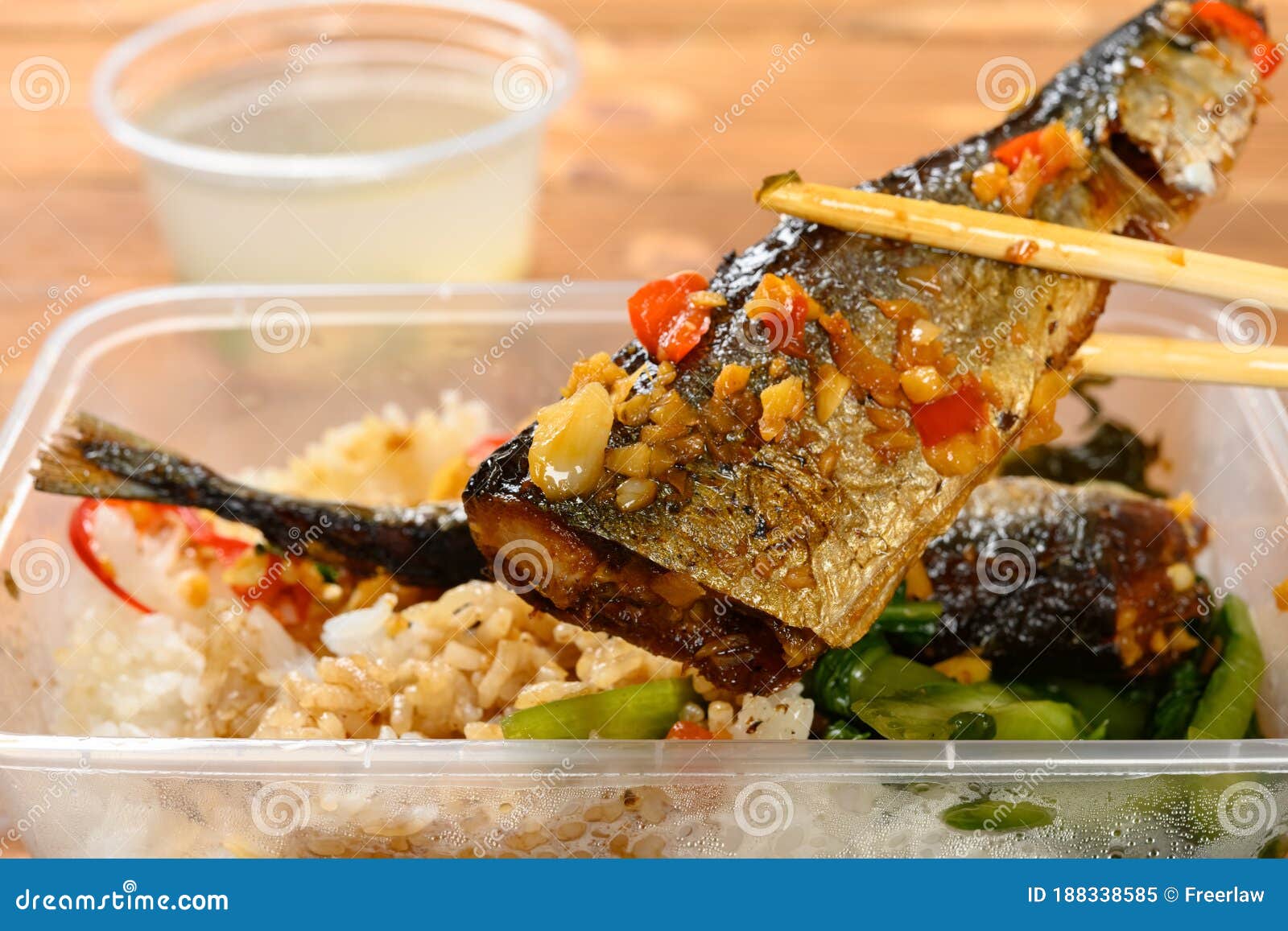 Chopsticks Taking Out Piece Fried Fish from Box of Fast Food Stock ...