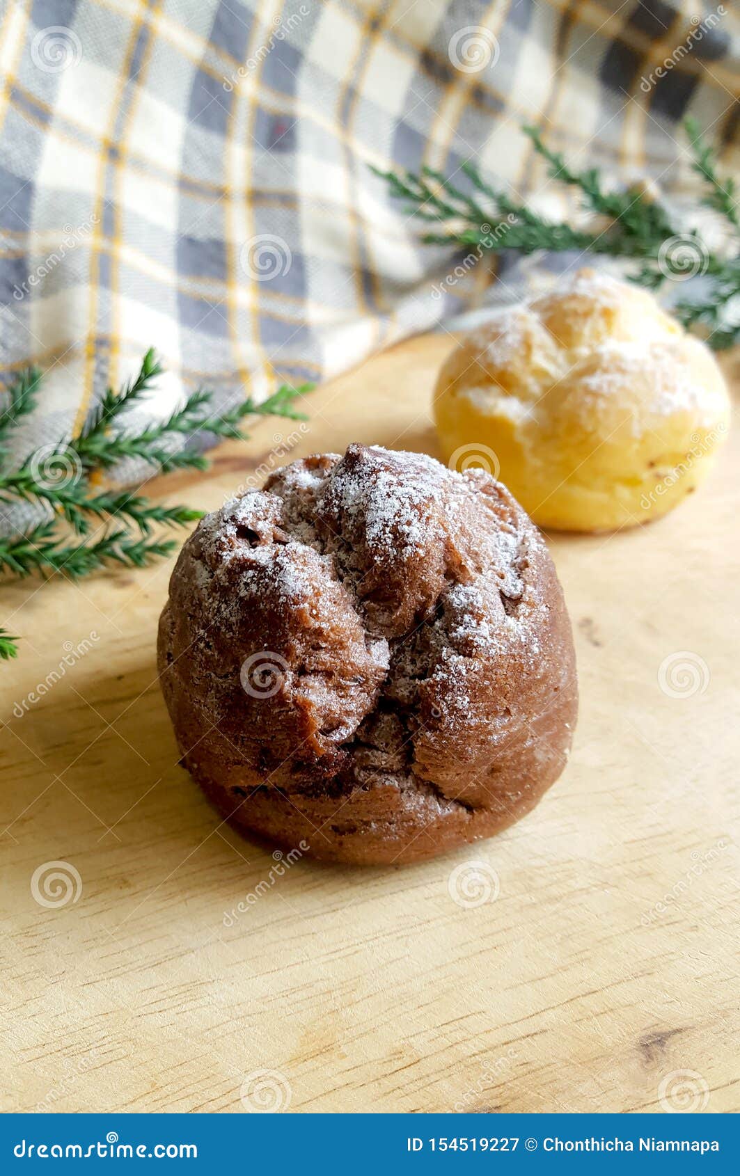 Choux Cream Puffs on Wooden Plate Stock Image - Image of plate, kitchen ...