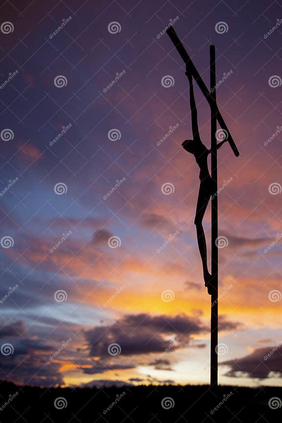 Christ`s Body on the Cross at Dawn. Backlight. Vertical Image ...