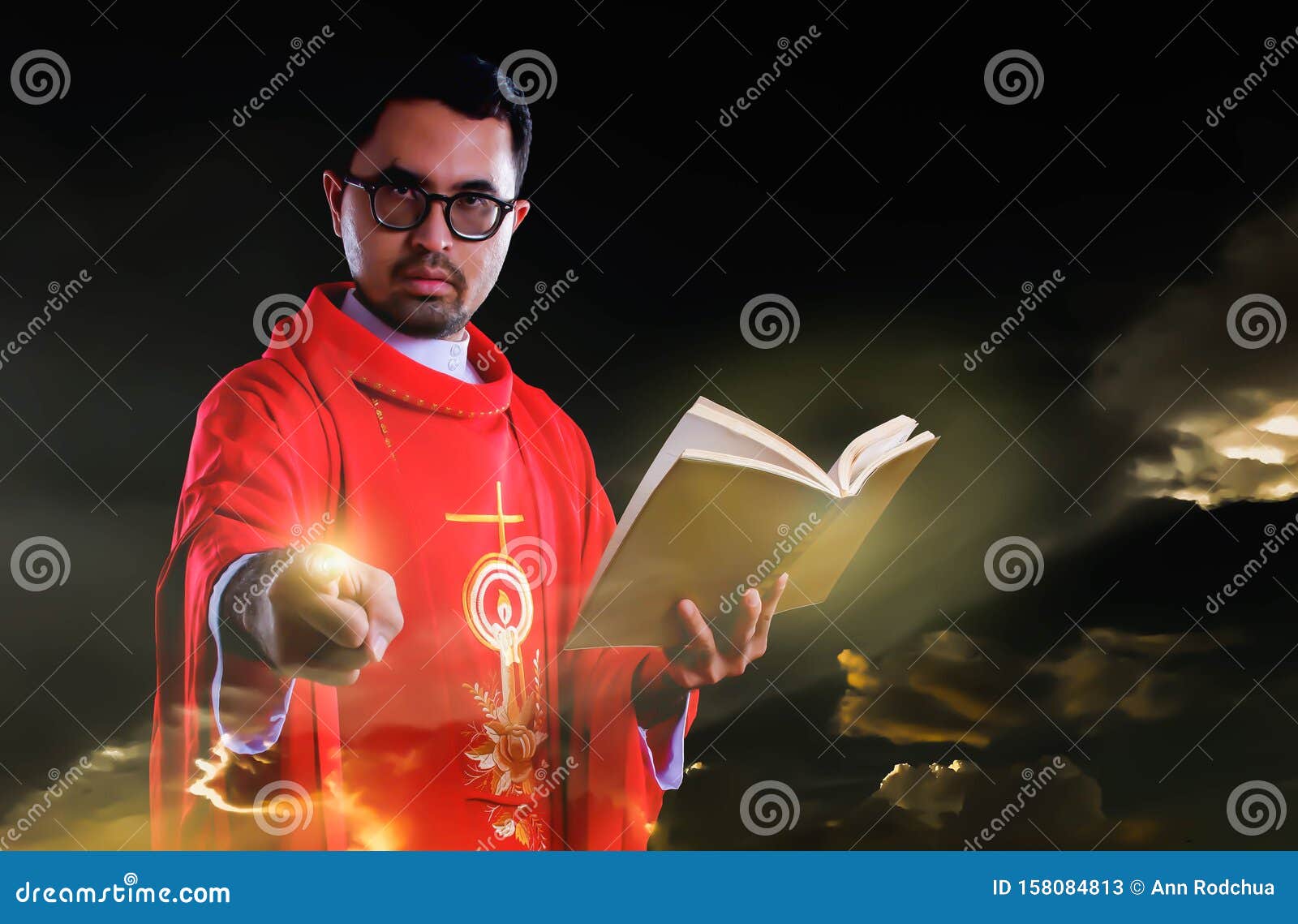 Christian Pastor Holding Scripture With Background Of Dark Sky Stock ...