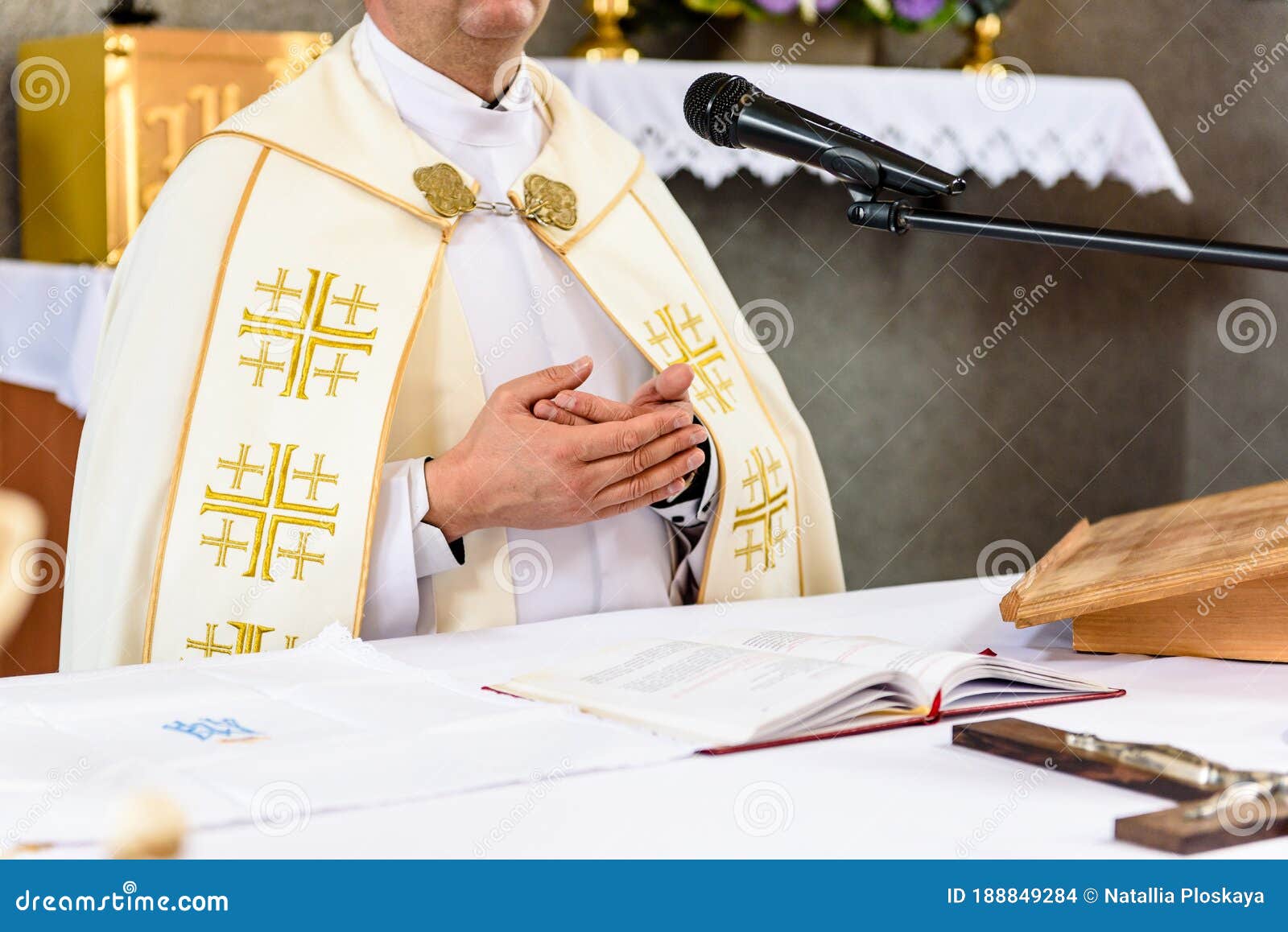 Priest Is Standing Near Lectern.high Table With Sloping Top For ...