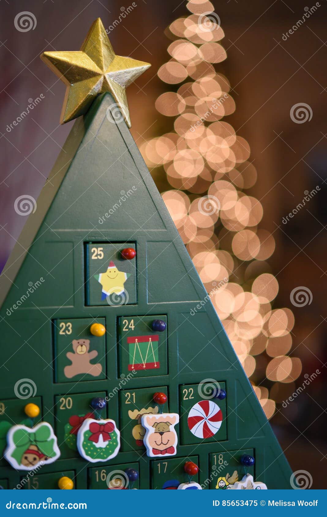 Christmas Advent Tree Against a Tree of Lights Stock Image - Image of ...