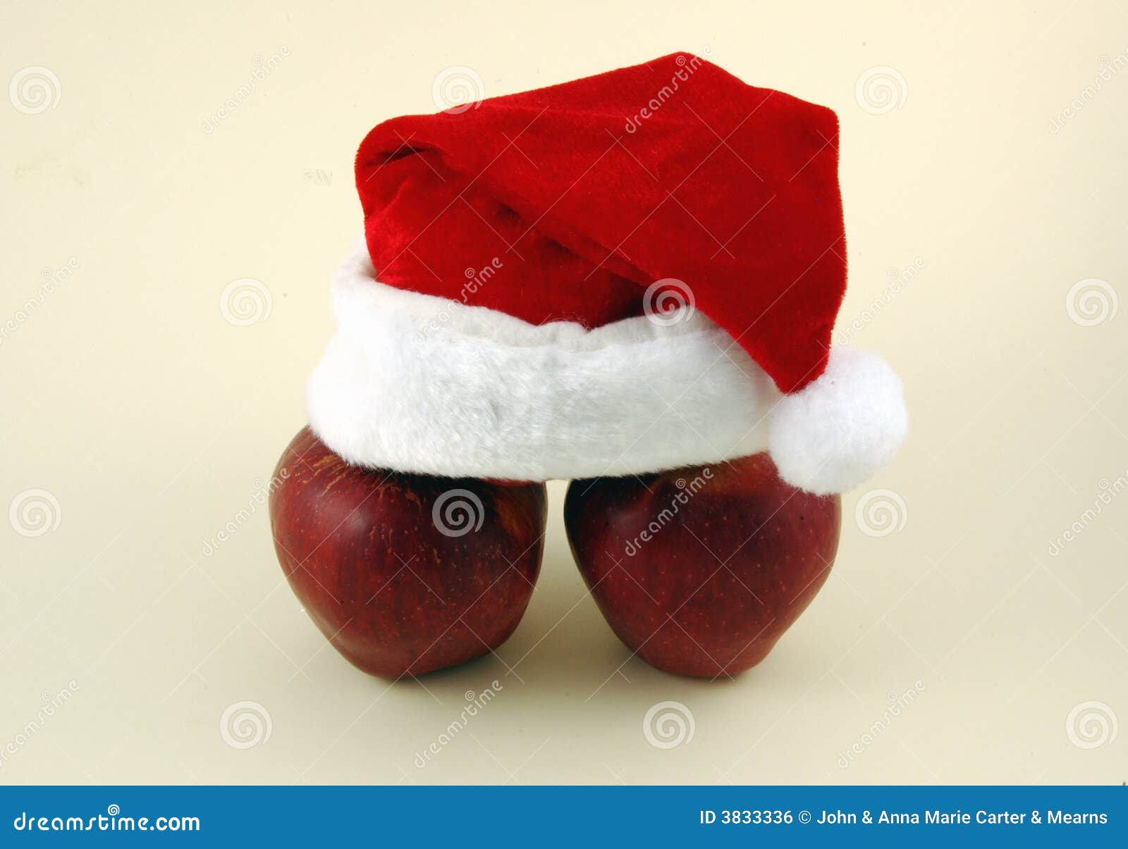 Christmas Apples with Santa Hat on a White Background. Stock Photo ...