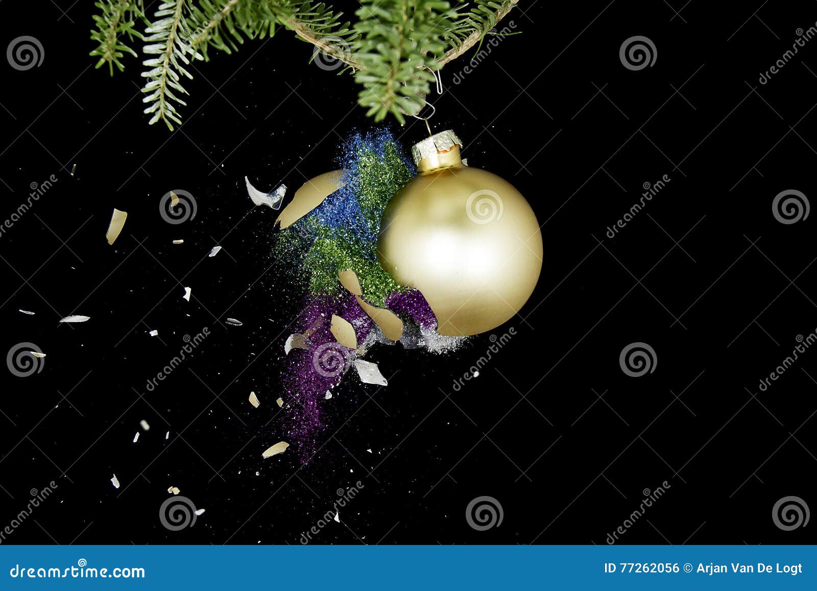 Christmas Ball Exploding. Colored Glitters Falling. Stock Photo - Image ...