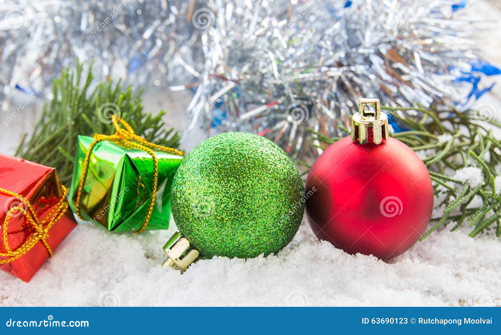 Christmas Ball and Gift Box on the Snow Stock Image - Image of holiday ...