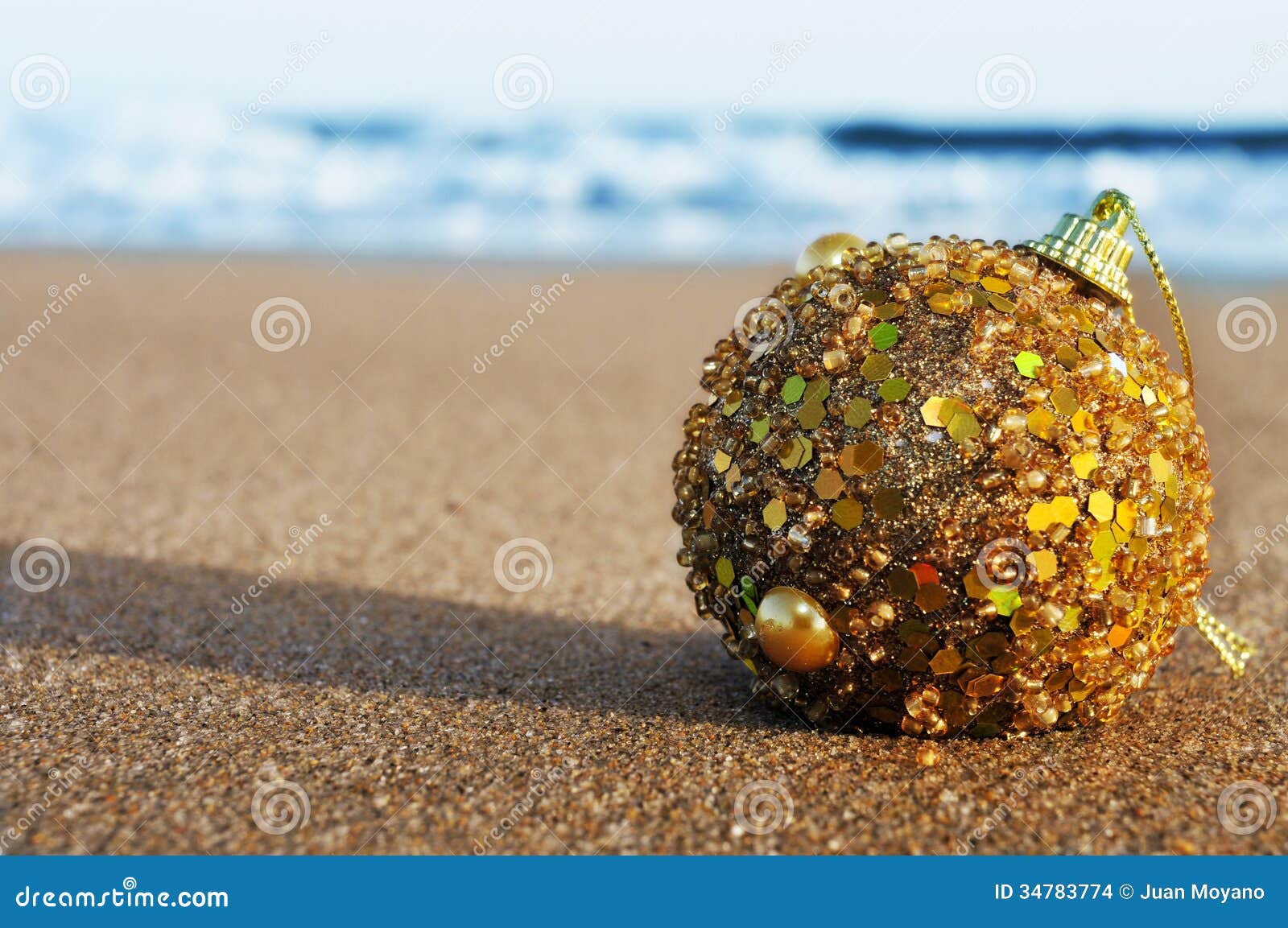 Christmas Ball on the Sand of a Beach Stock Photo - Image of bauble ...