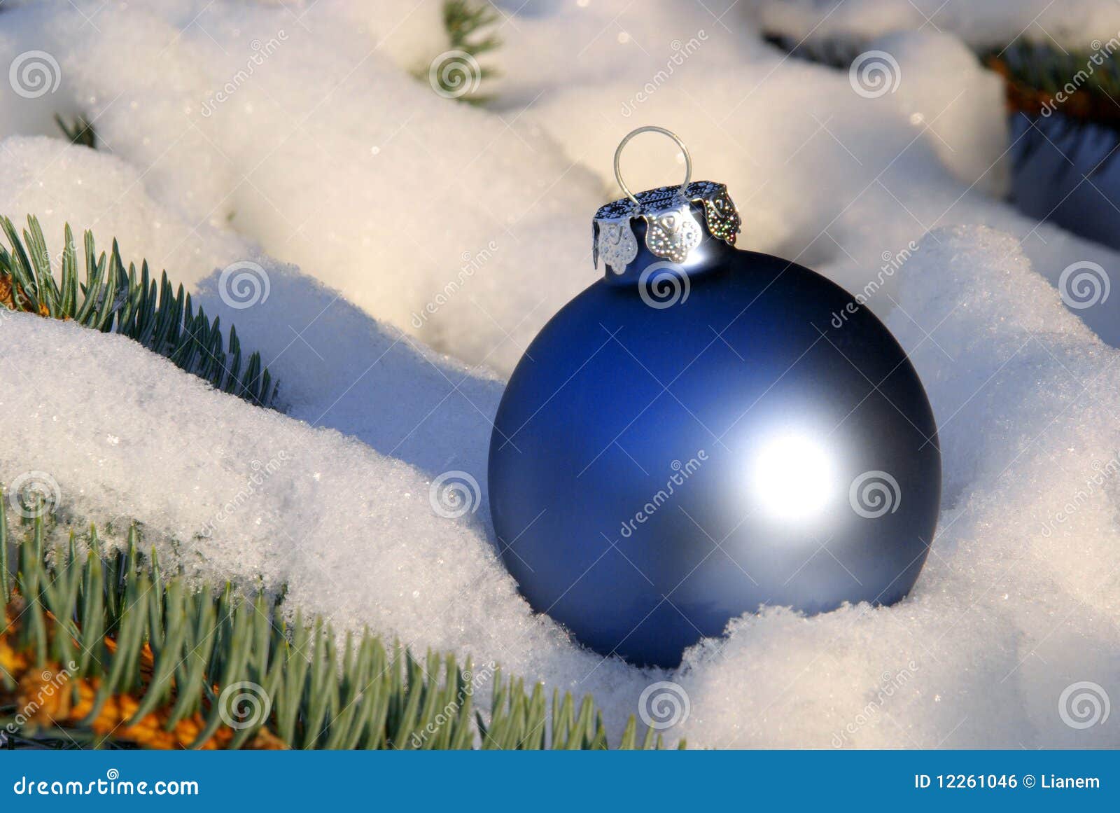 Christmas ball in snow stock photo. Image of blue, bright - 12261046