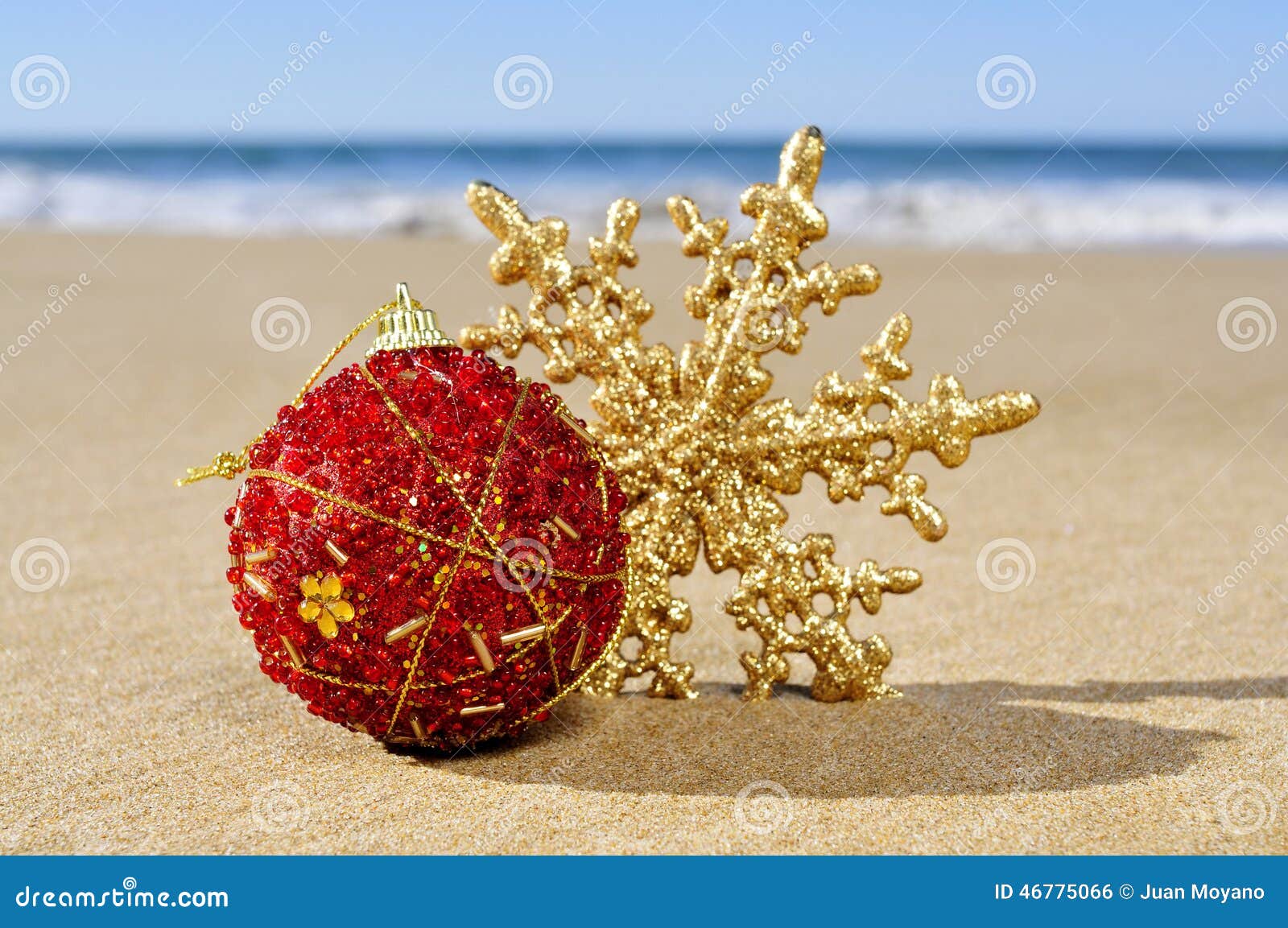 Christmas Ball and Star on the Beach Stock Photo - Image of golden ...