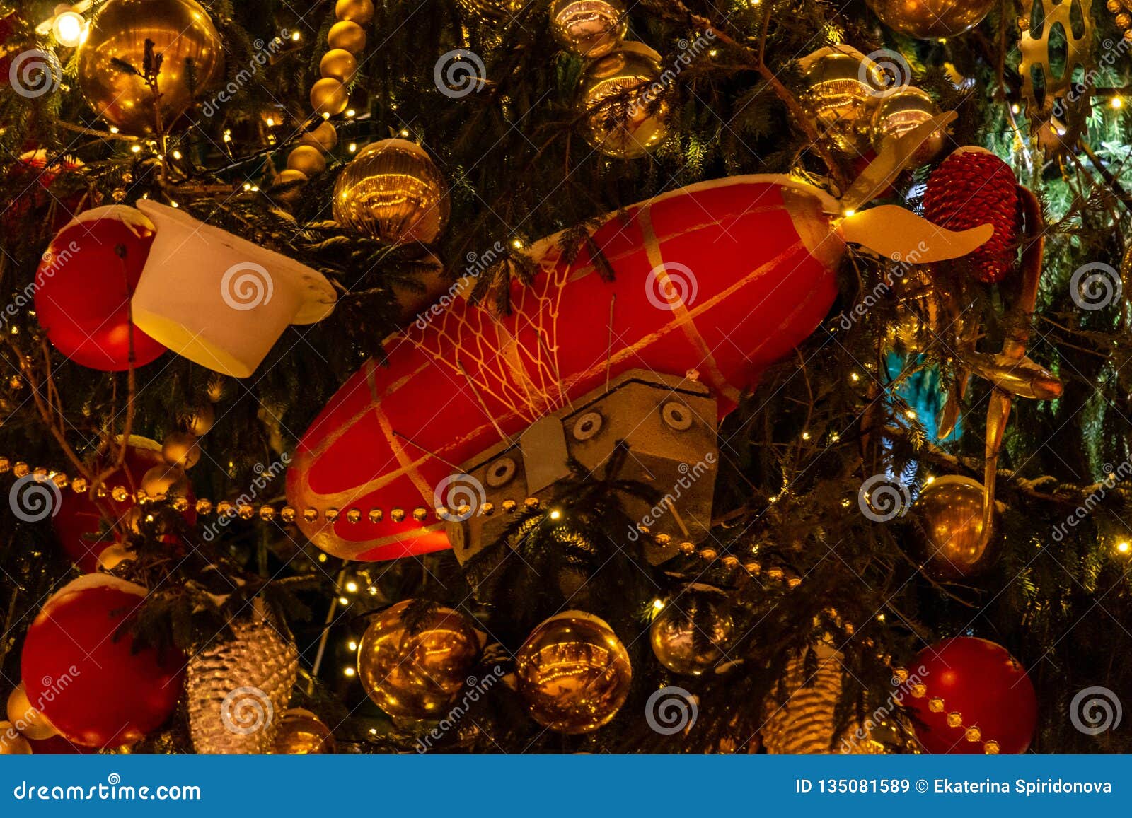 Christmas Ball on the Christmas Tree on Red Square Stock Image - Image ...