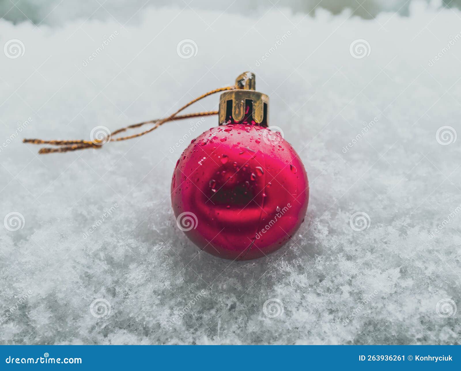 Christmas Bauble in the Snow, Single Red Bauble Stock Image - Image of ...