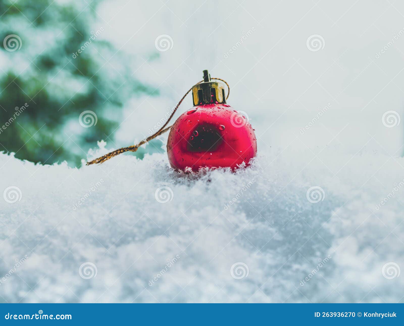 Christmas Bauble in the Snow, Single Red Bauble Stock Photo - Image of ...