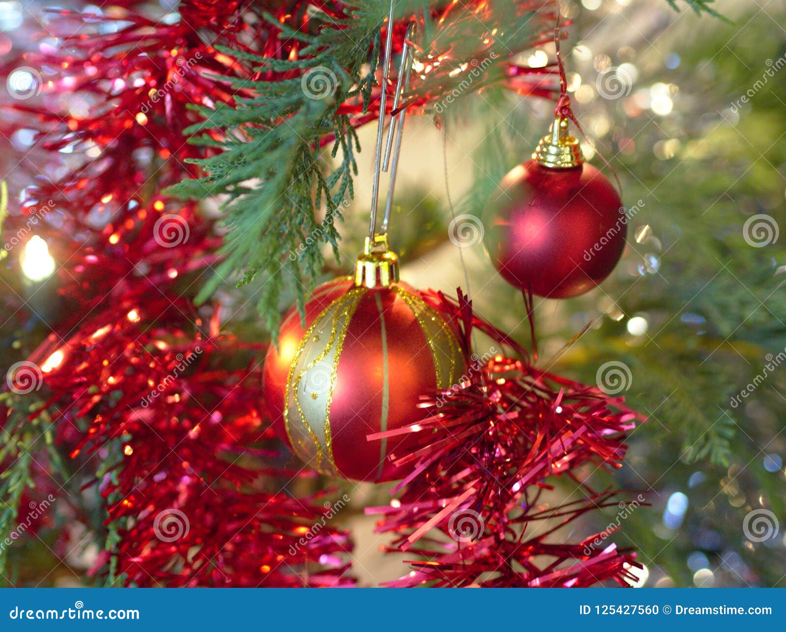 Christmas Baubles Hanging from Tree Stock Photo - Image of tinsel ...