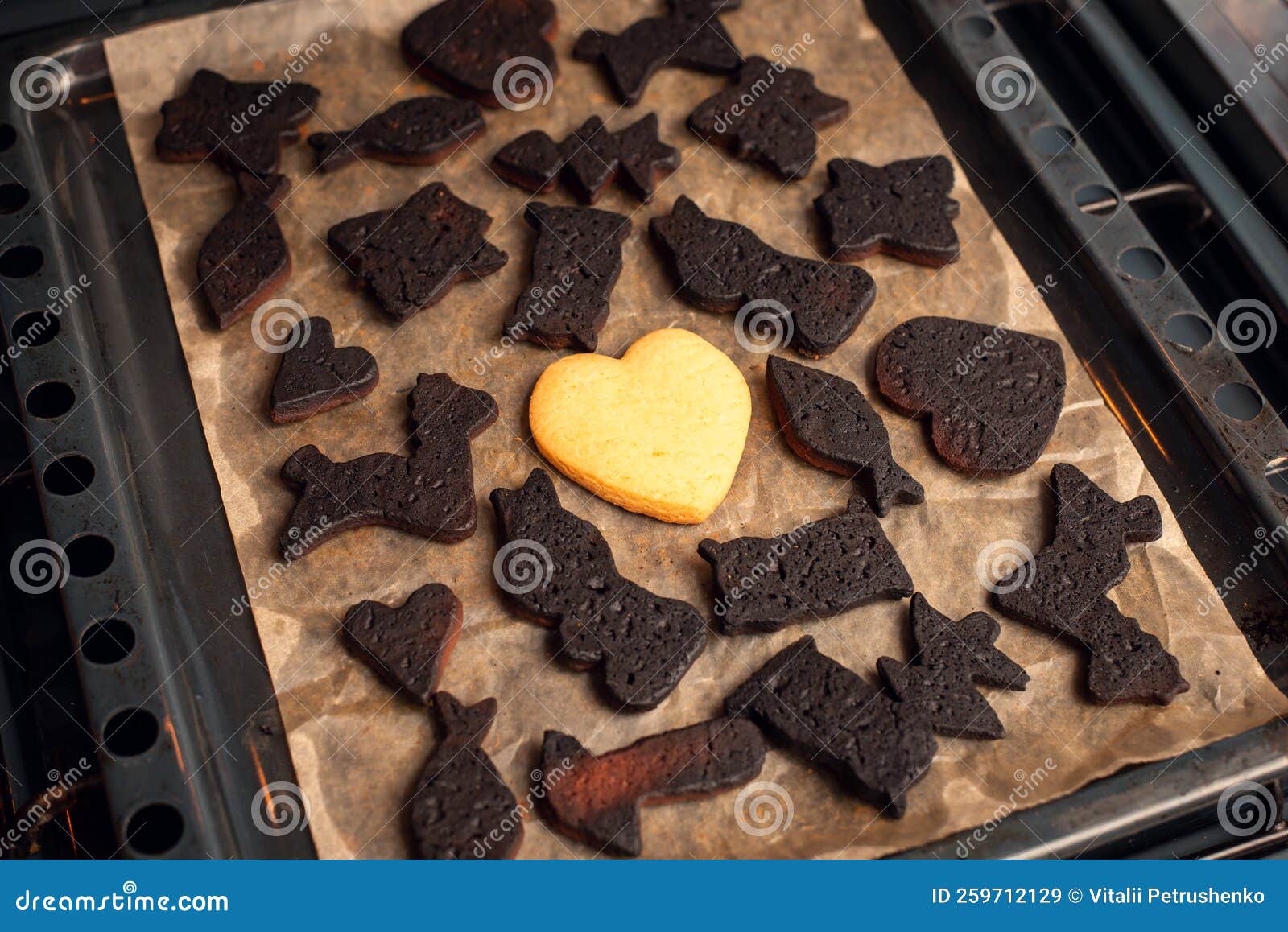Christmas Biscuits in Different Shapes on Baking Tray Stock Image ...