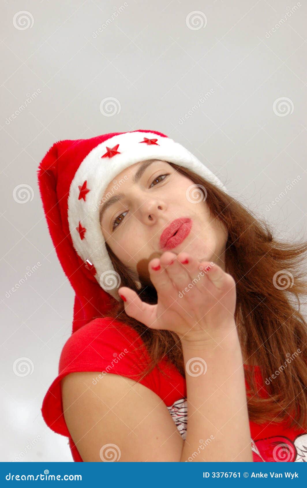 Christmas blow kiss stock image. Image of blowing, girl - 3376761
