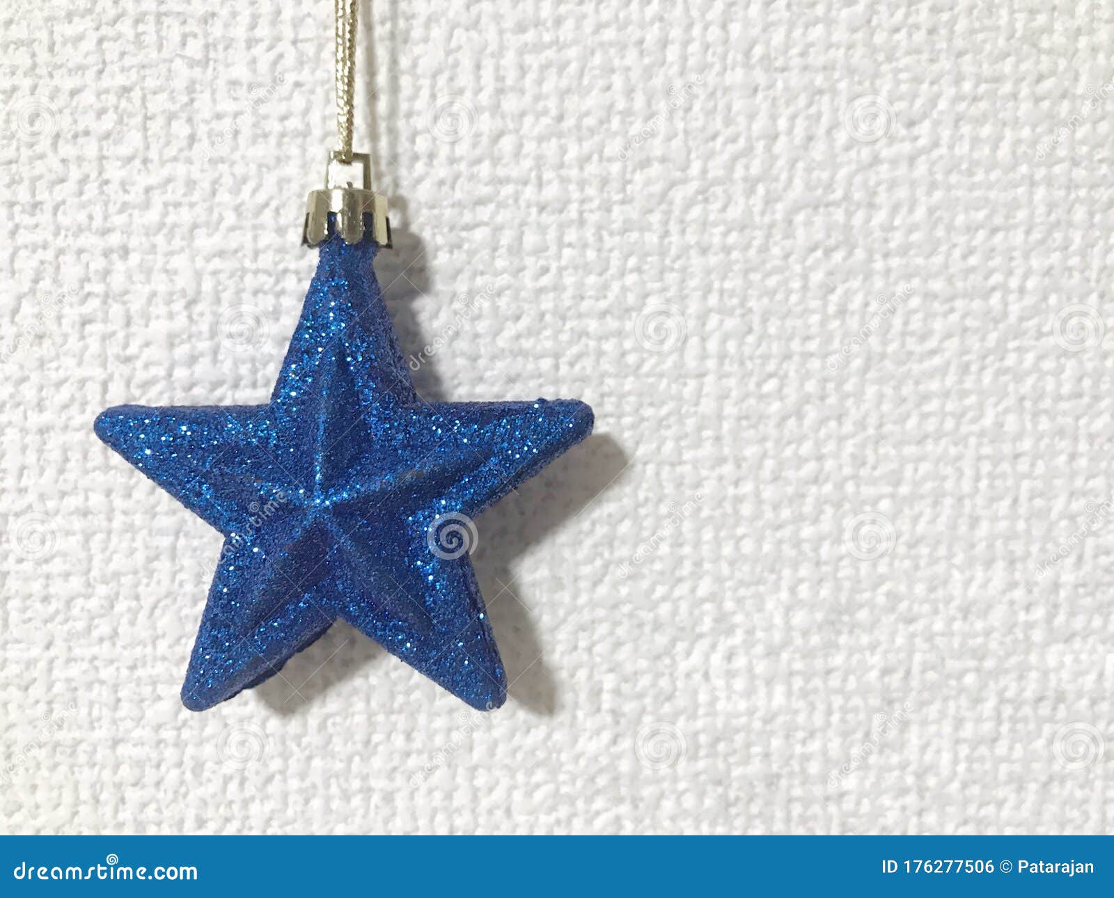 Christmas Blue Star Shape Object on Copy Space Wall Background Stock ...