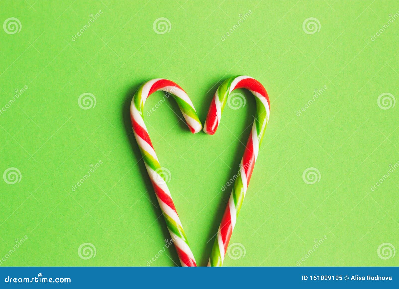 Christmas Candy Canes on Green Background. Heart. Stock Image - Image ...