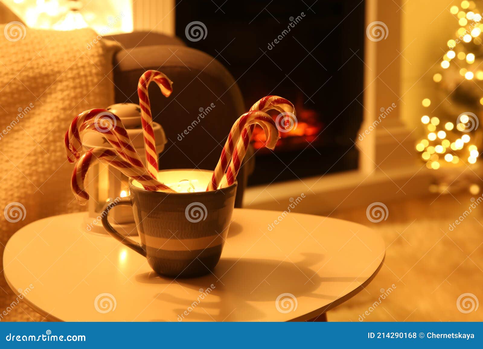 Christmas Candy Canes on Table in Room with Fireplace Stock Photo ...