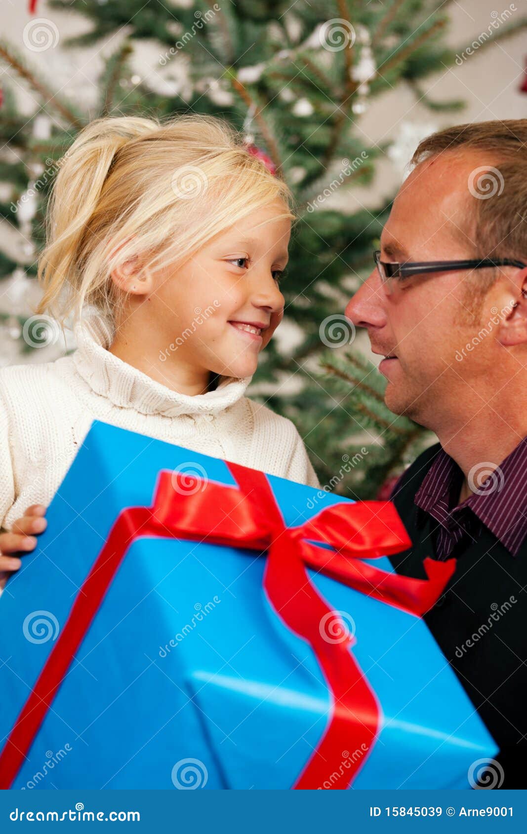 Christmas - Child Receiving a Gift Stock Image - Image of excitement ...