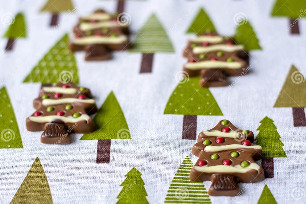 Christmas Chocolate Trees on Background with Trees Stock Photo - Image ...
