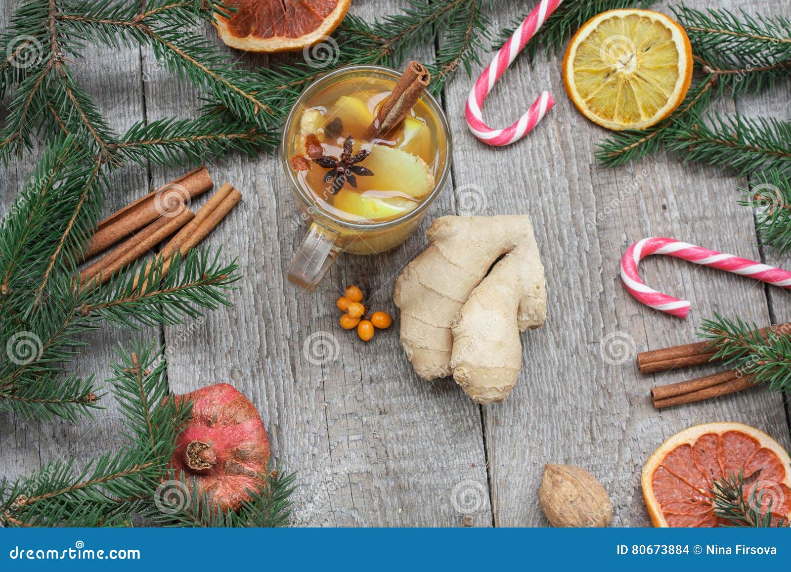Christmas Composition. Spruce Branches, Candy Cane, Warming Tea with ...