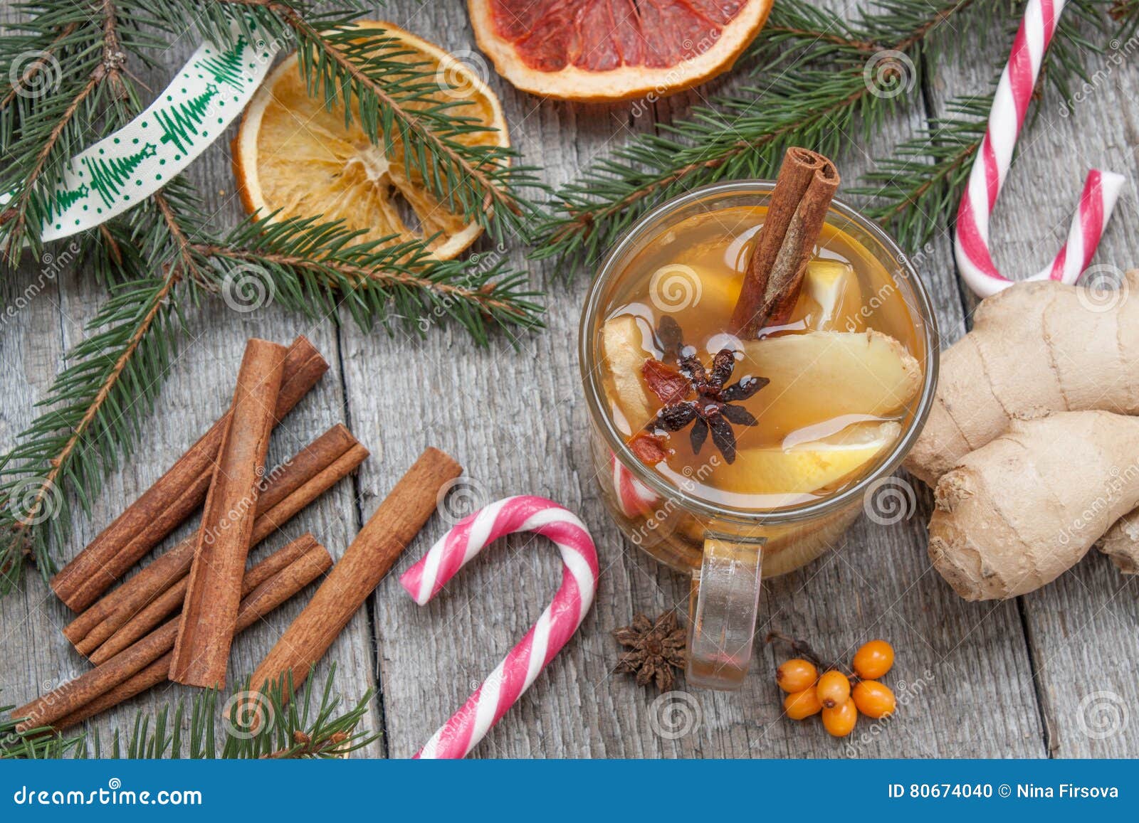 Christmas Composition. Spruce Branches, Candy Cane, Warming Tea with ...