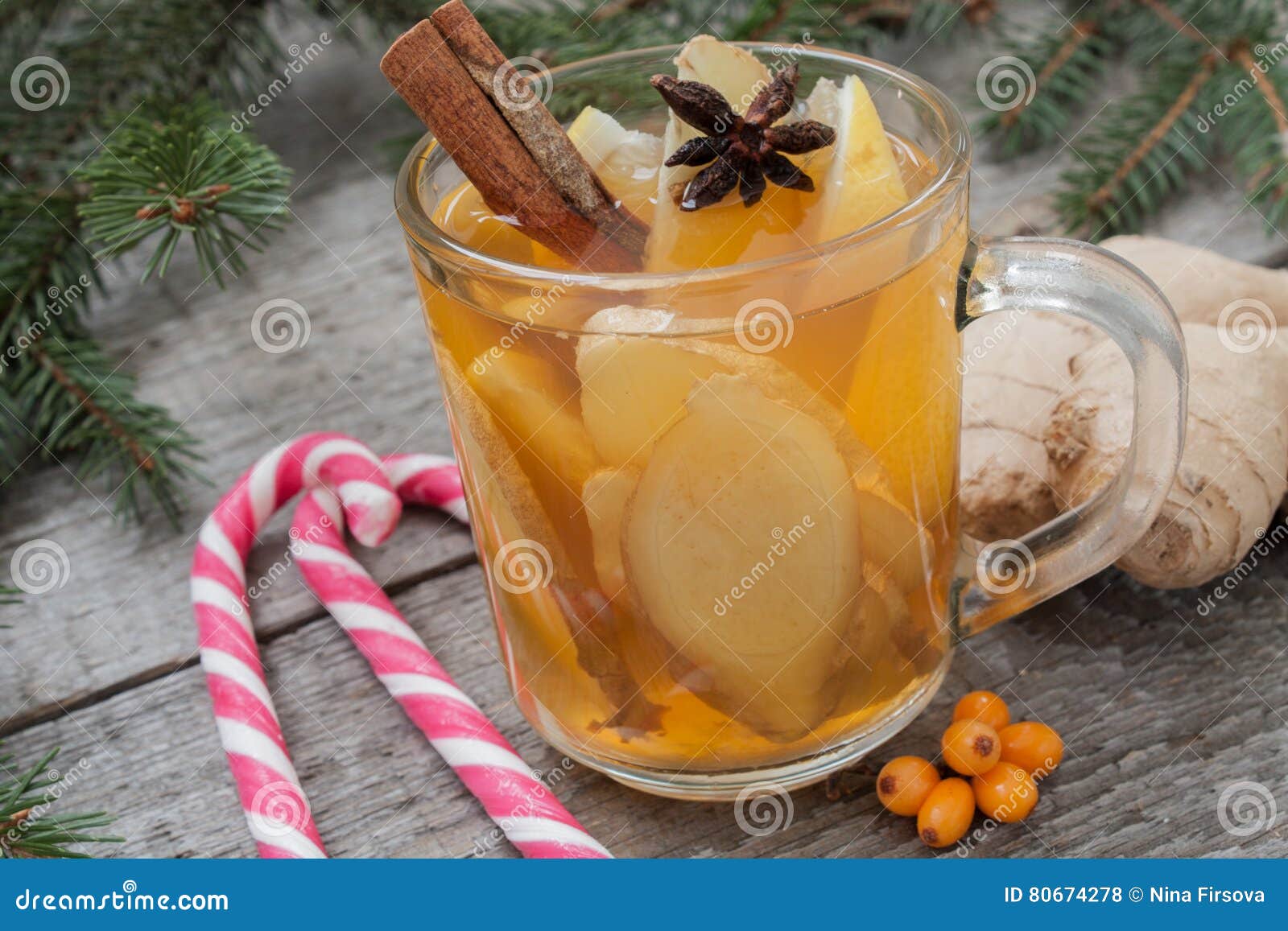 Christmas Composition. Spruce Branches, Candy Cane, Warming Tea with ...
