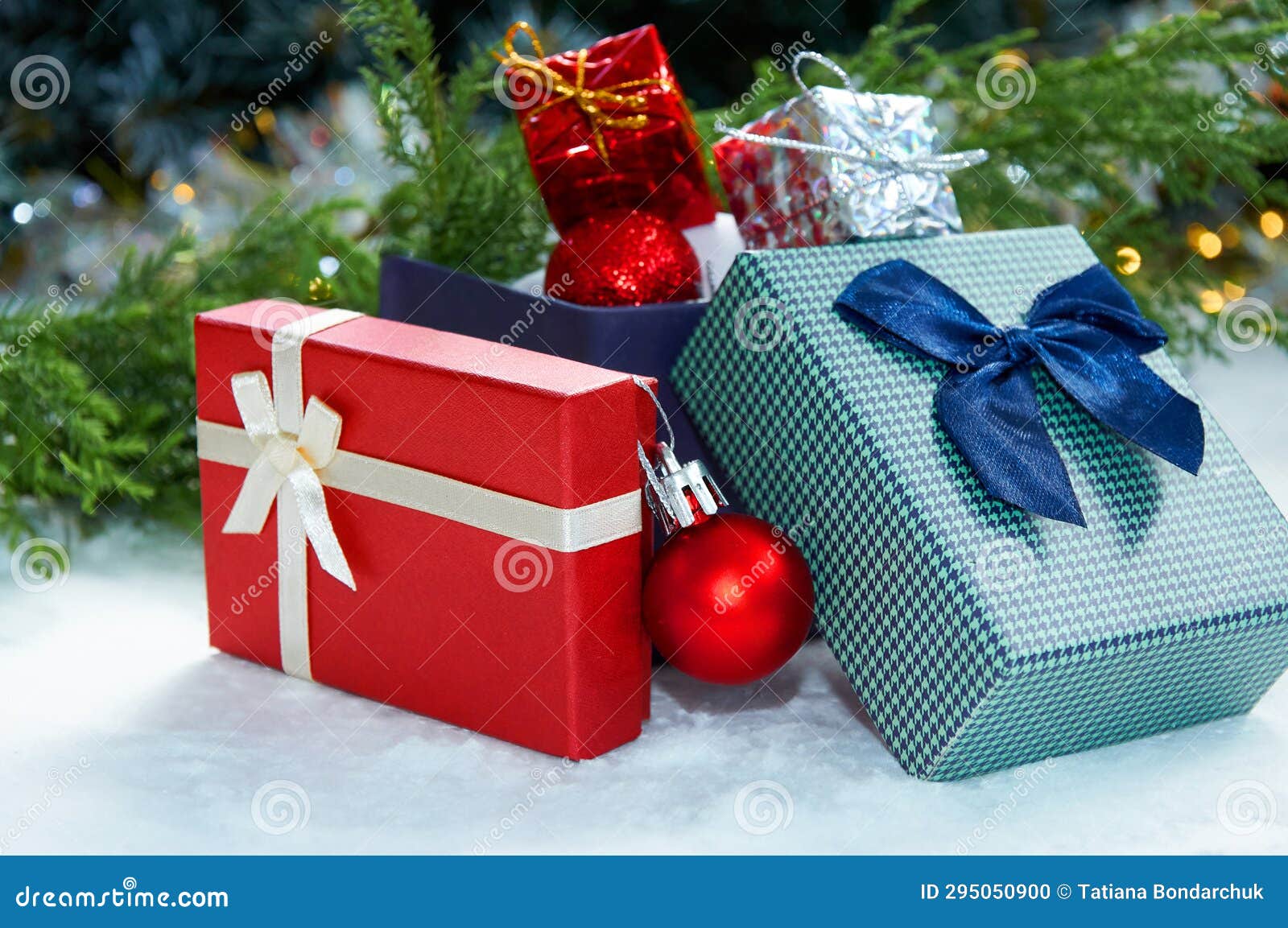 Christmas Composition with Christmas Tree Branches, Red Tinsel, Gift ...