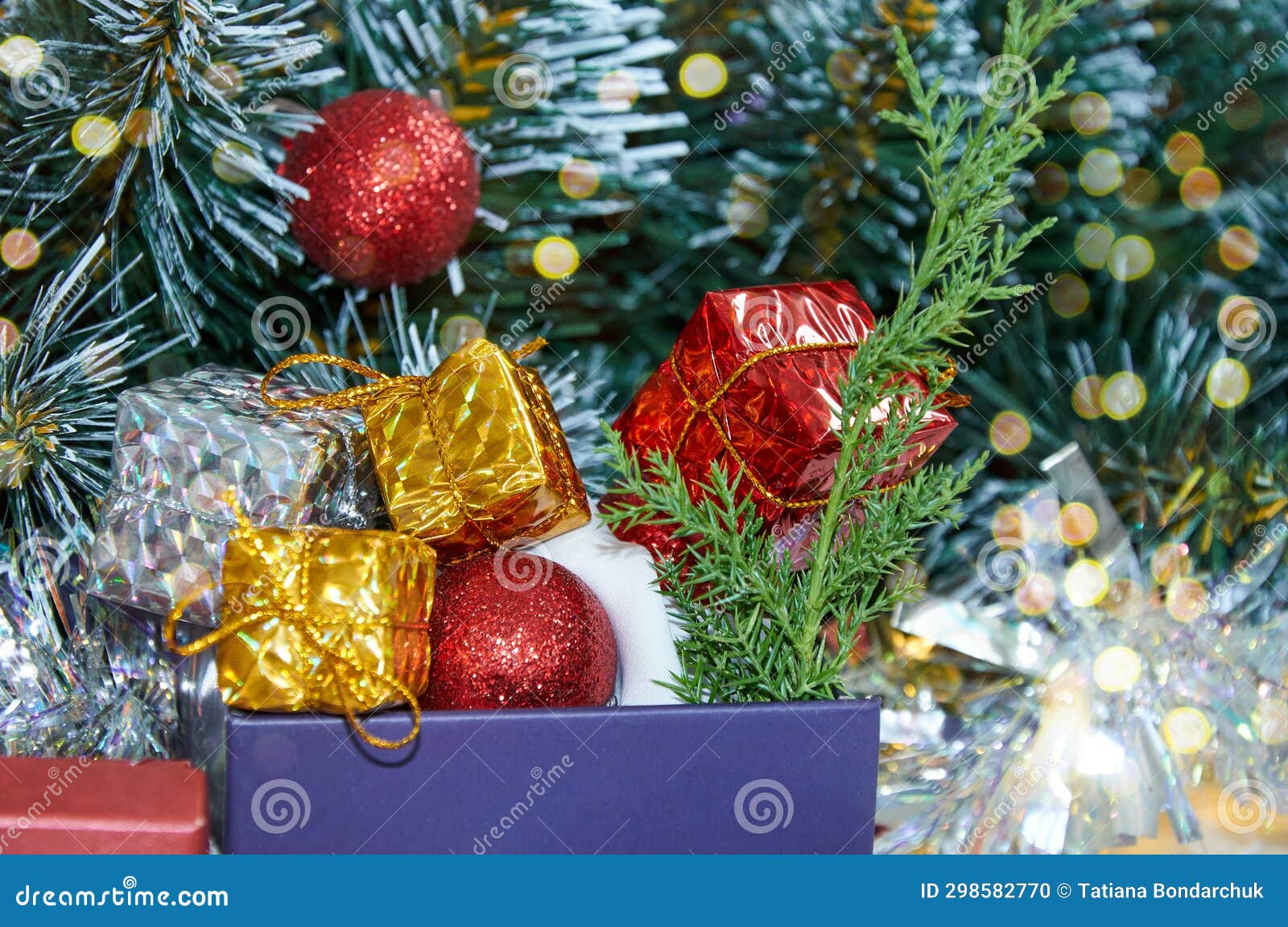 Christmas Composition with Christmas Tree Branches, Red Tinsel, Gift ...