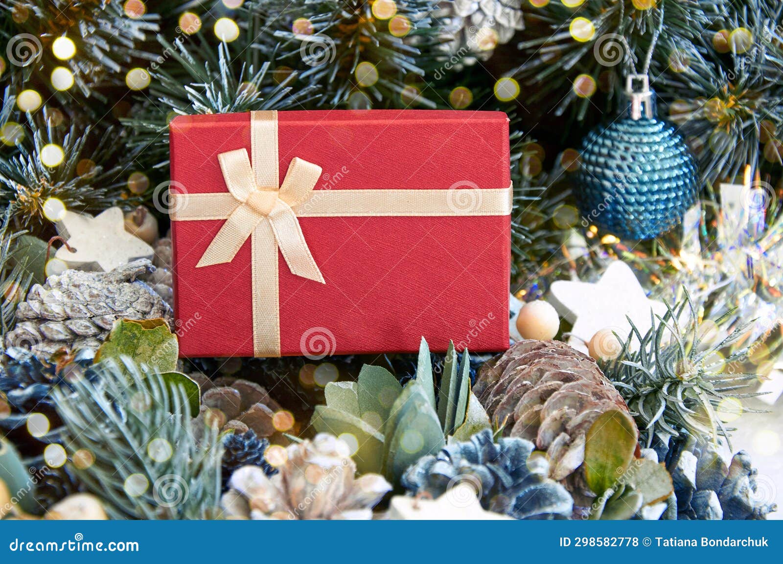 Christmas Composition with Christmas Tree Branches, Red Tinsel, Gift ...