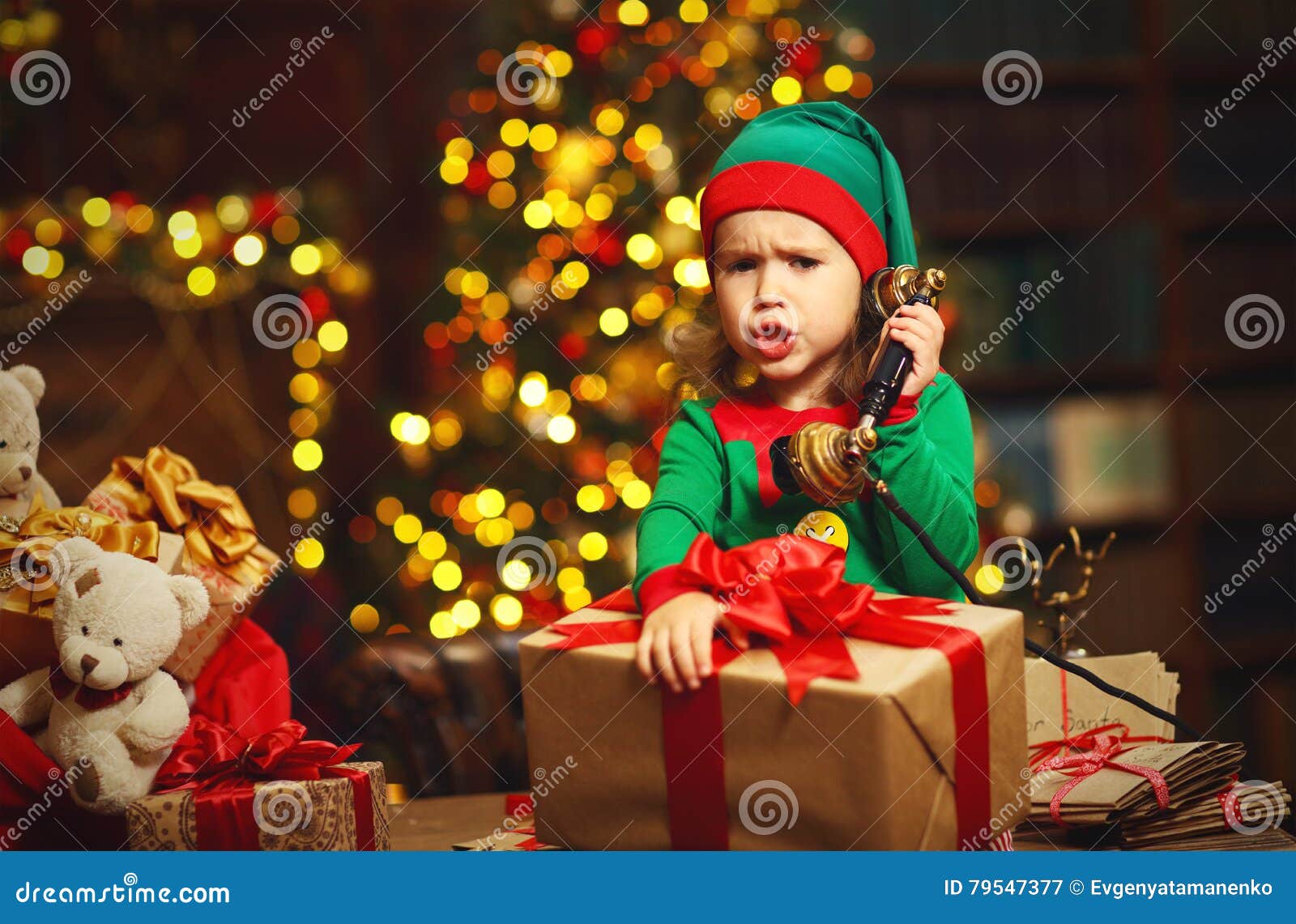 Christmas Concept. Elf Child Working, Talking on the Phone Stock Image ...