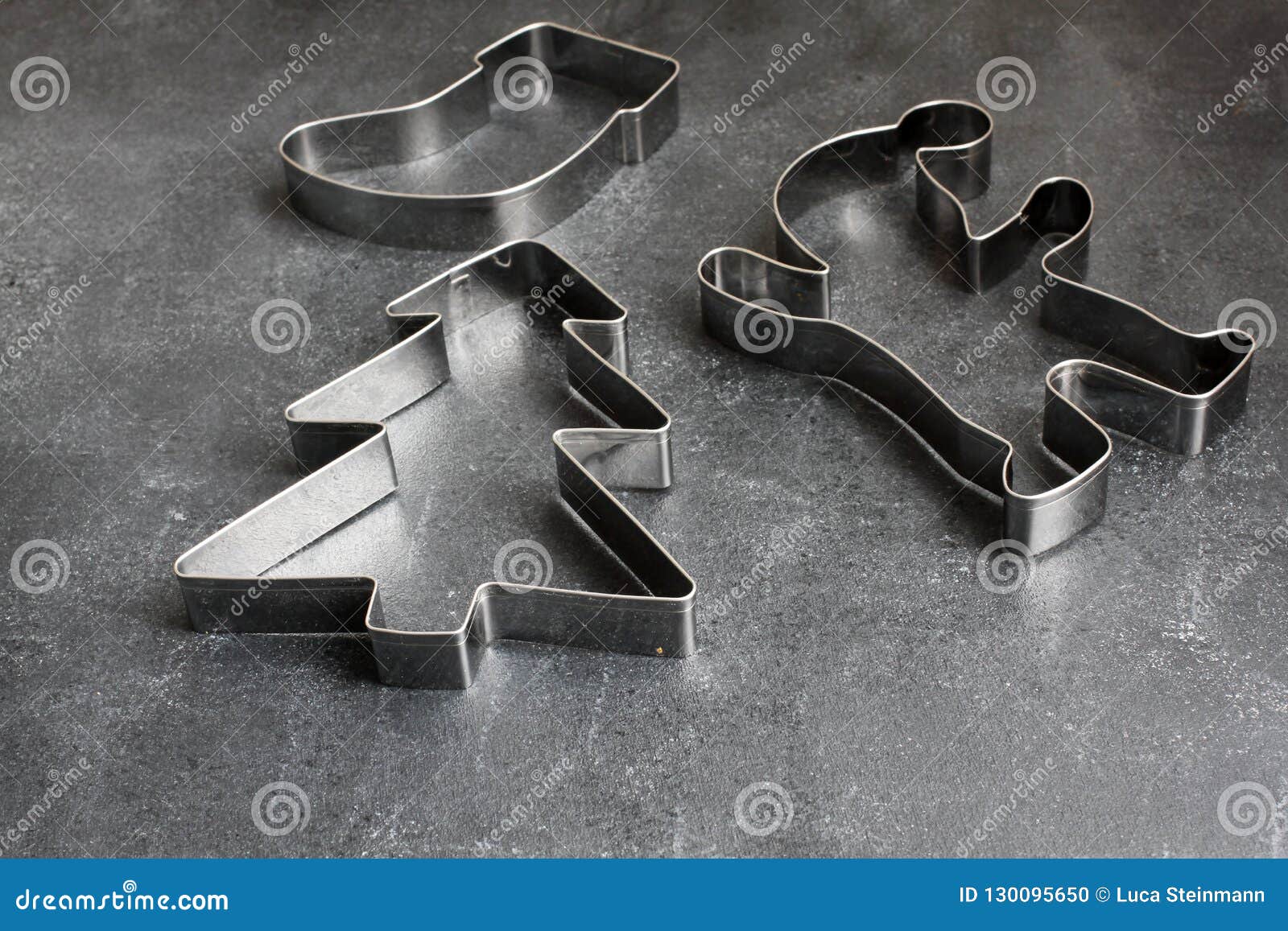 Christmas Cookie Cutter Santa Claus, Christmas Tree and Boot on Dark ...