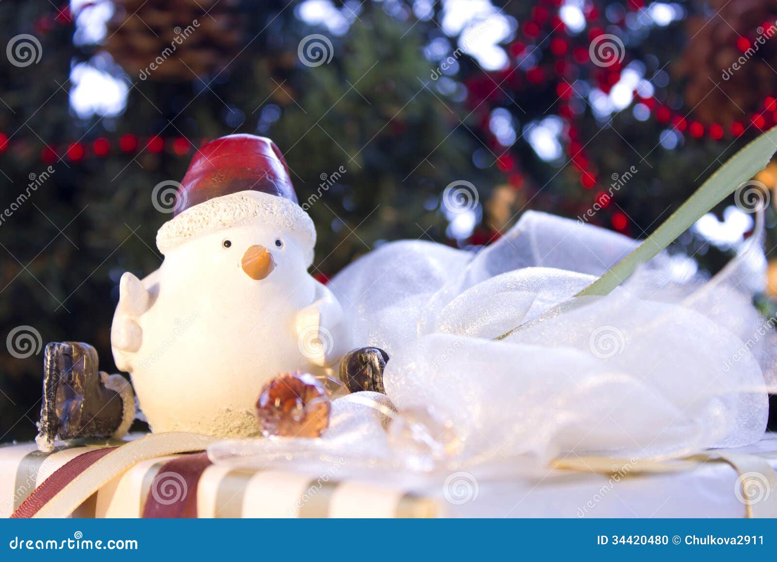 Christmas Decorating with Beautiful Bird and Present Stock Photo ...