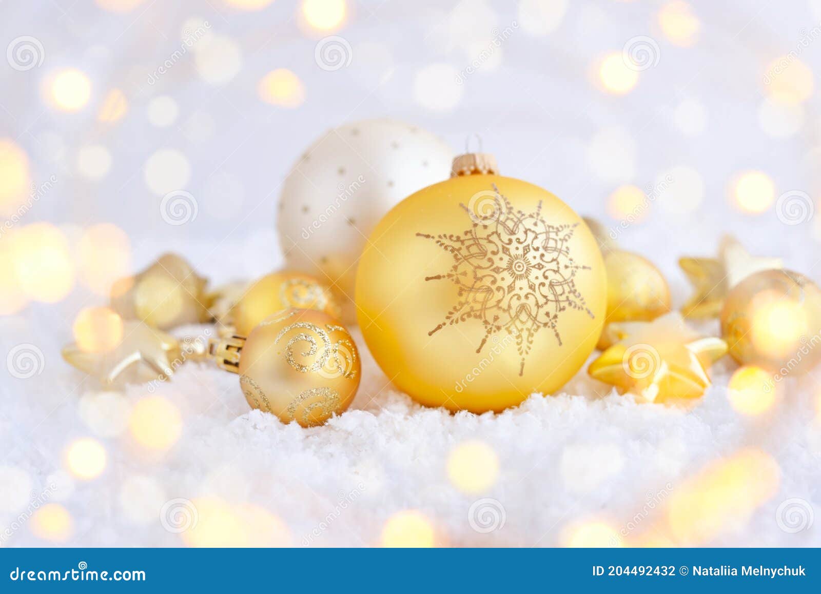 Christmas Decorative Balls on Snow and Christmas Lights. Festive ...