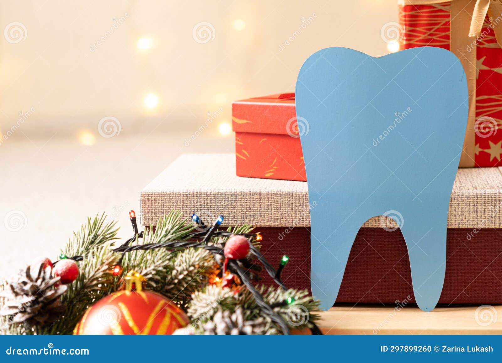 Christmas Dentistry - Tooth on the Background of Flashing Garlands and ...